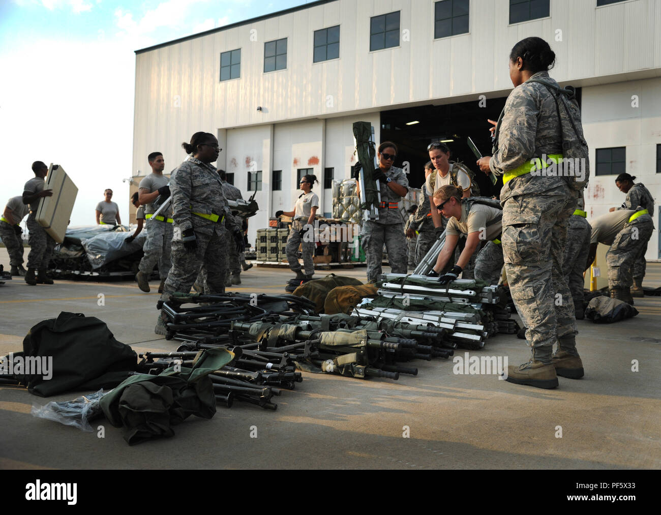 Members of the 927th Aeromedical Staging Squadron organize supplies at ...