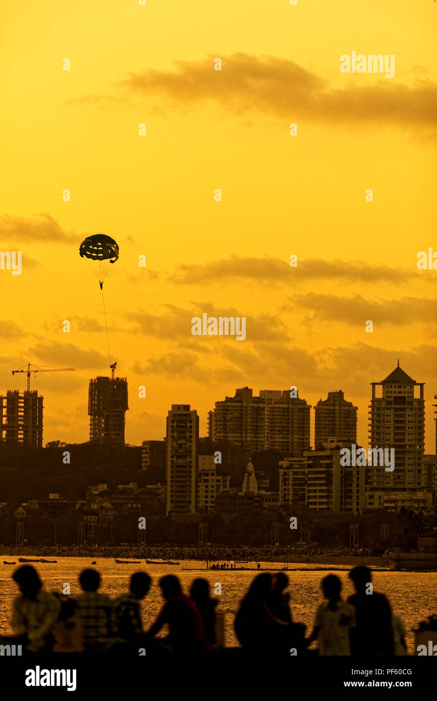 Skyline showing Walkeshwar area at sunset from marine drive in Mumbai ...