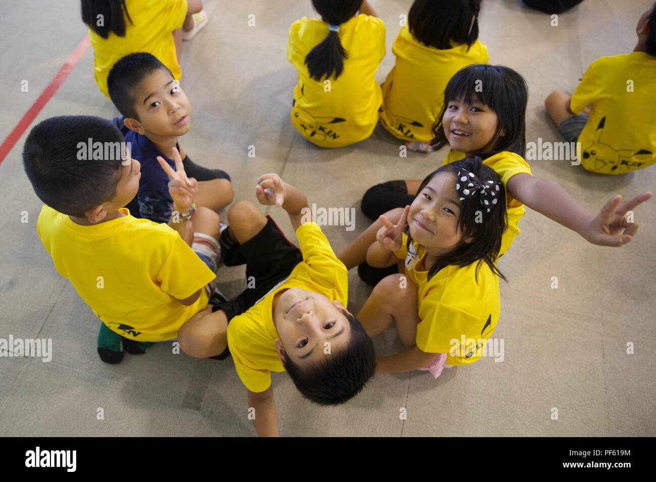 Okinawan children smile for the camera at Kin District Daycare, Okinawa ...