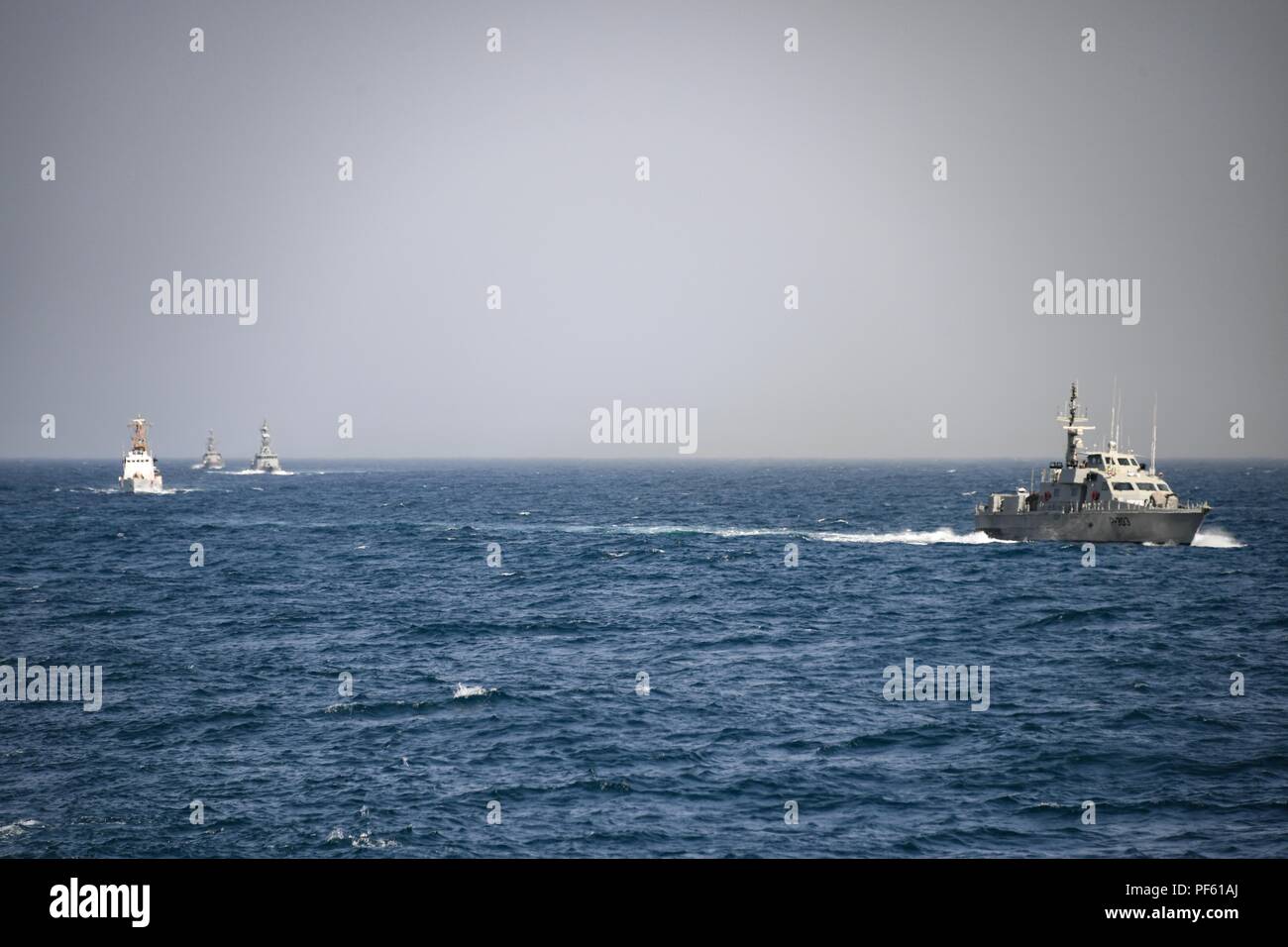 180813-N-RM440-2170 ARABIAN GULF (Aug. 13, 2018) From left to right, U ...