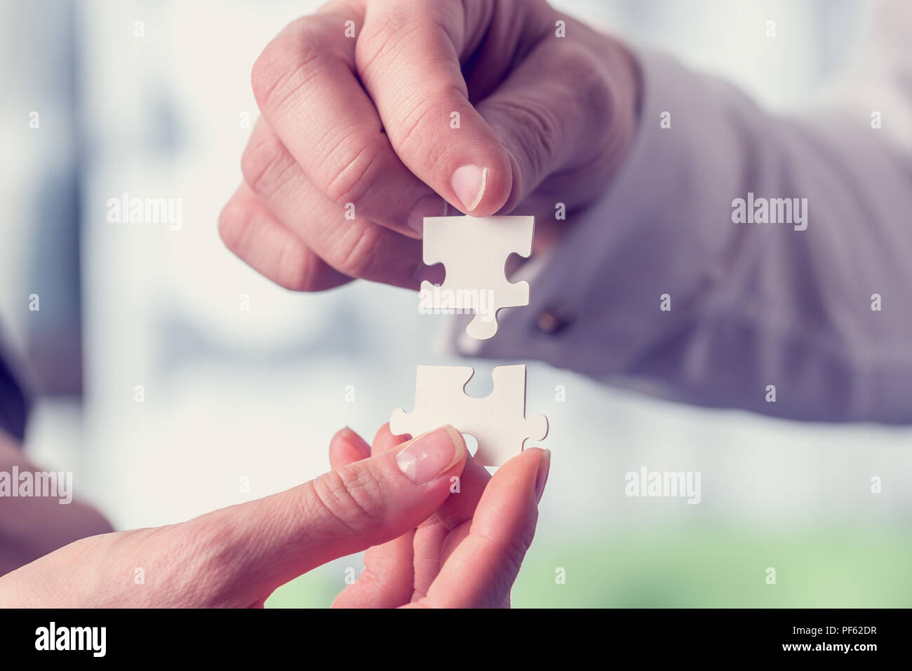 Retro vintage style image of a businesspeople fitting together matching ...