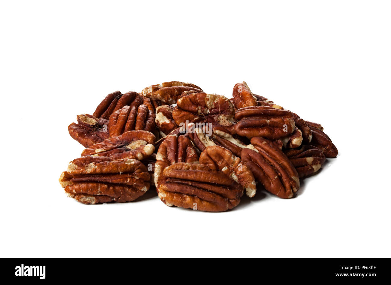 Close up of Pecan nuts isolated on white background Stock Photo - Alamy