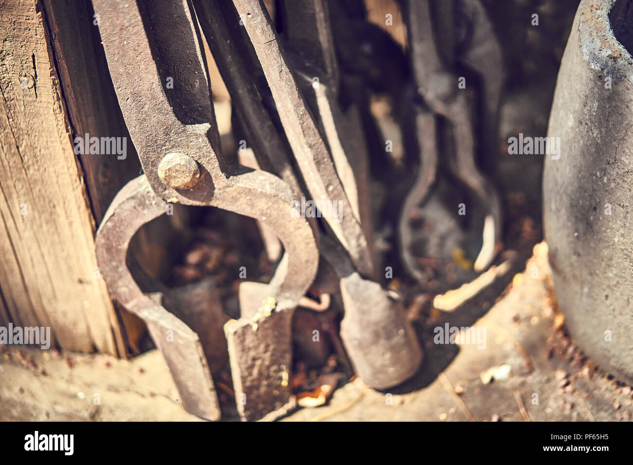 Old and oxide tools in a farm Stock Photo - Alamy
