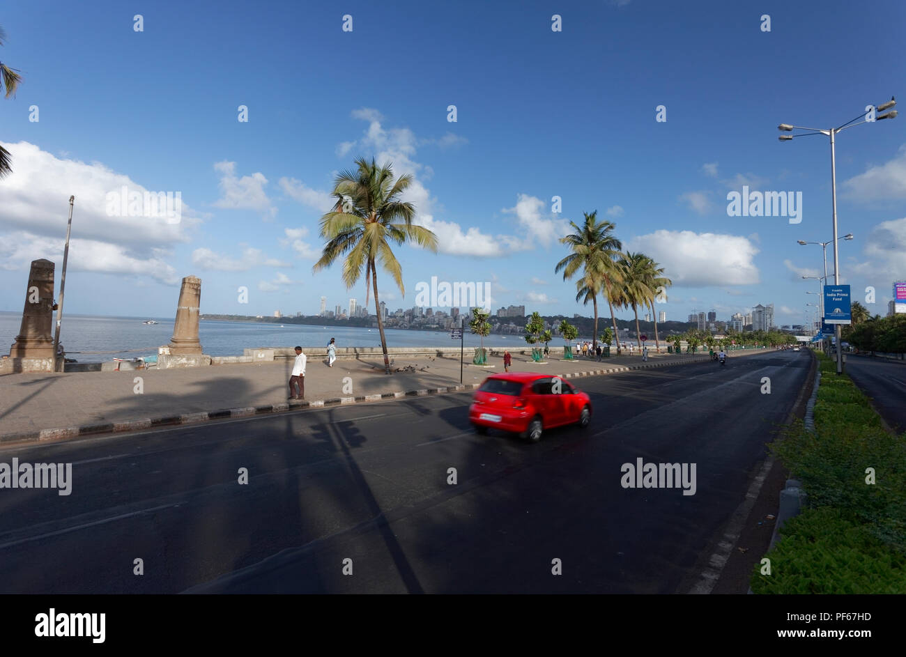Skyline showing Walkeshwar area and vehicle traffic at marine drive in ...