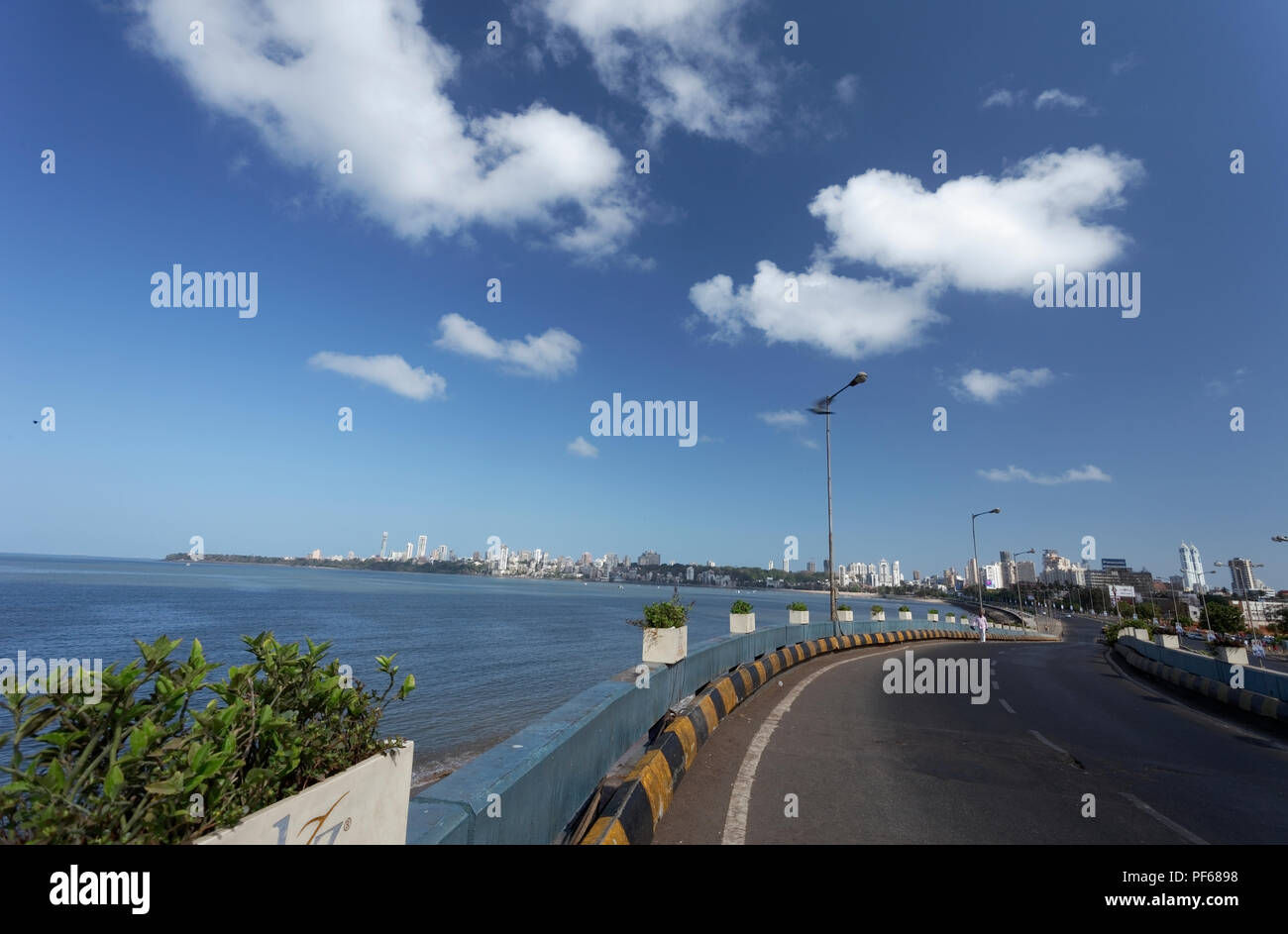 Skyline showing Walkeshwar area and vehicle traffic at marine drive in ...