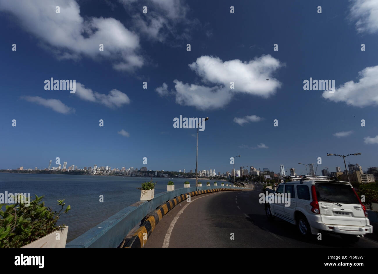 Skyline showing Walkeshwar area and vehicle traffic at marine drive in ...