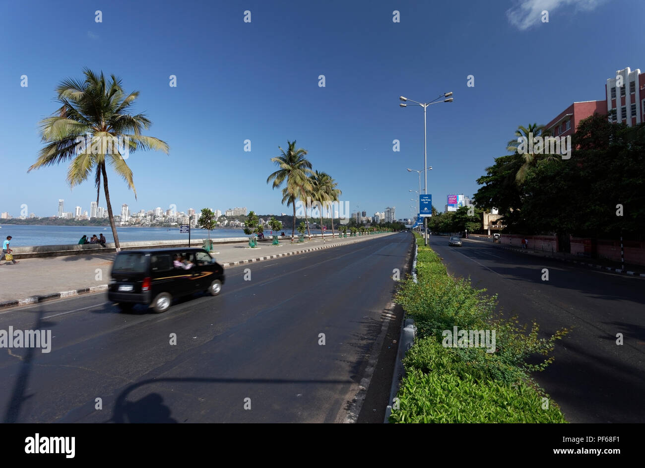 Skyline showing Walkeshwar area and vehicle traffic at marine drive in ...