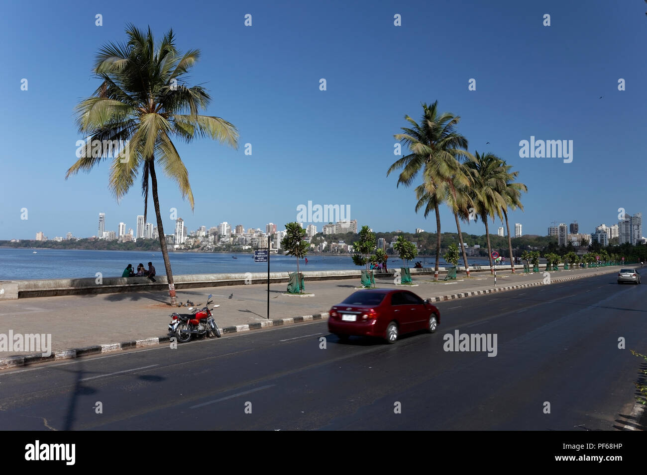 Skyline showing Walkeshwar area and vehicle traffic at marine drive in ...