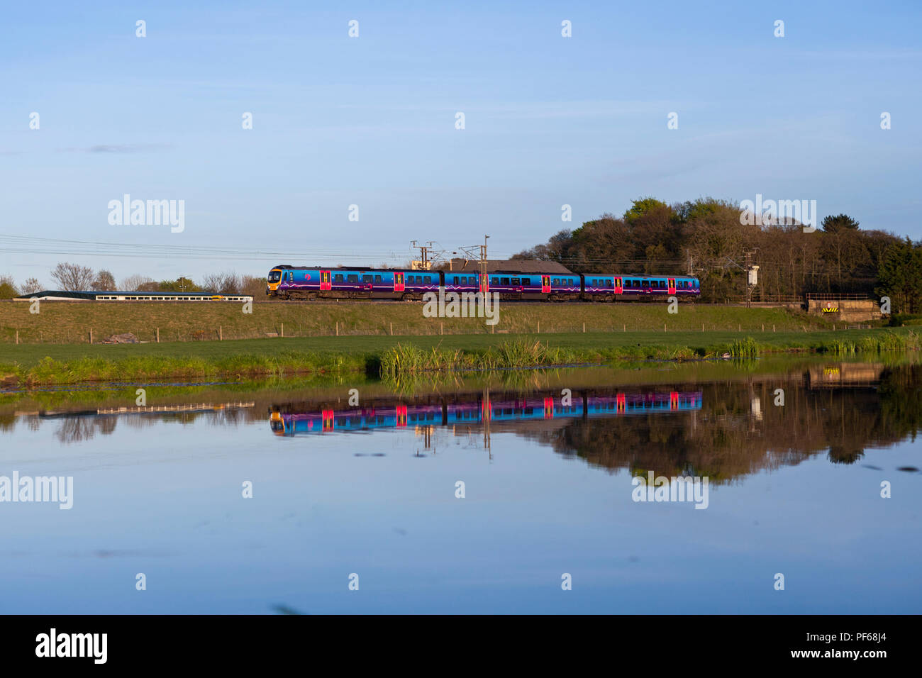 A First Transpennine Express class 185 diesel train reflected in the ...