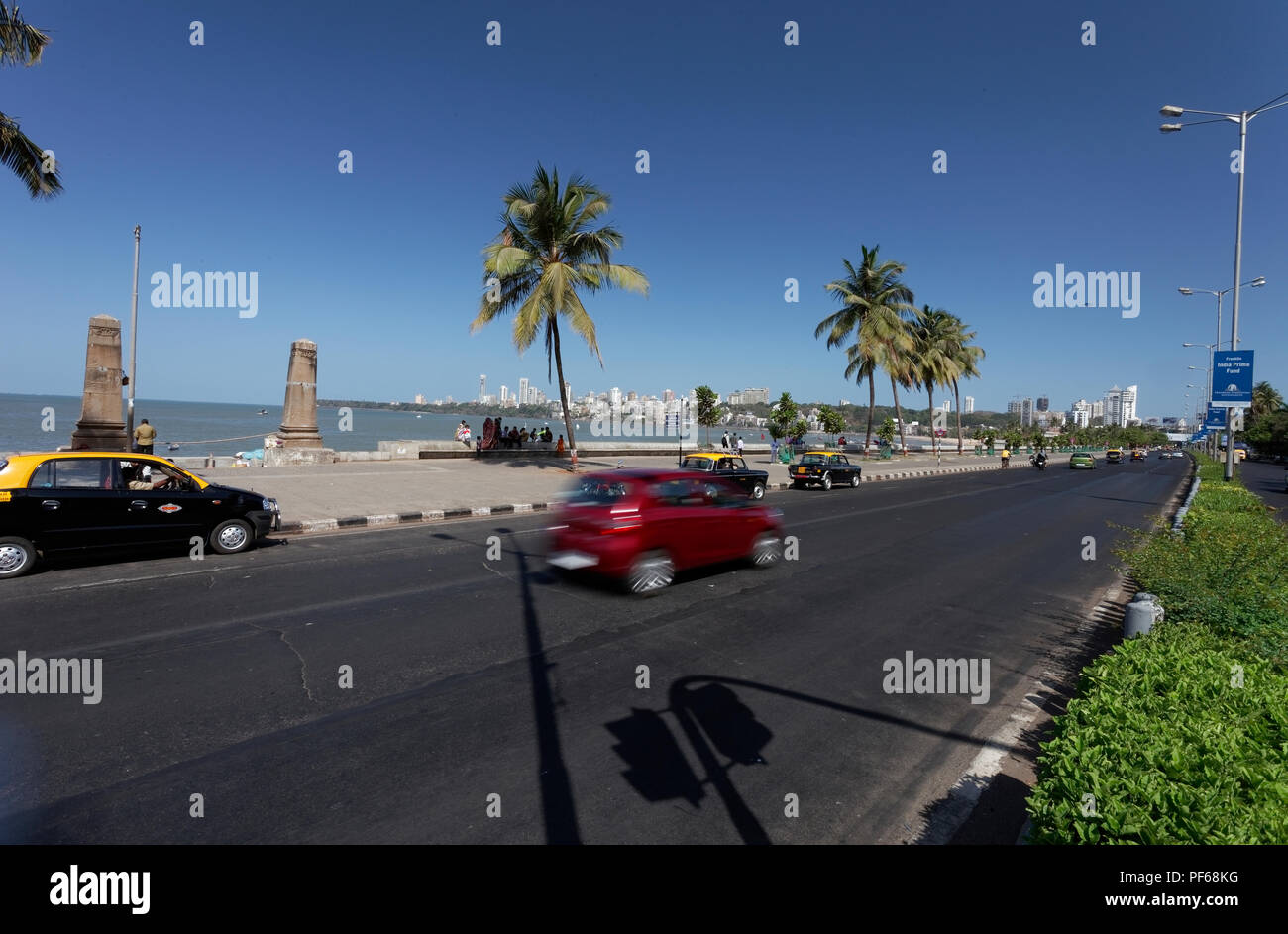 Skyline showing Walkeshwar area and vehicle traffic at marine drive in ...