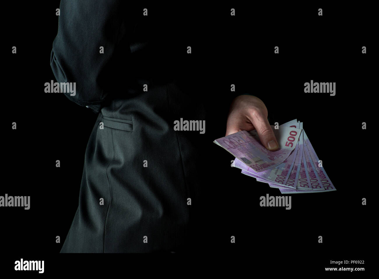 Hide money behind back hi-res stock photography and images - Alamy