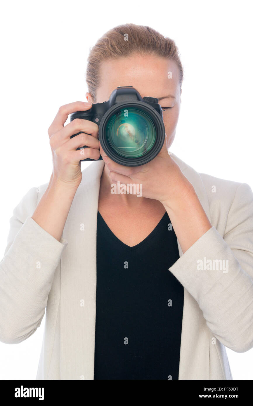 Female photographer takes images with dslr camera Stock Photo - Alamy
