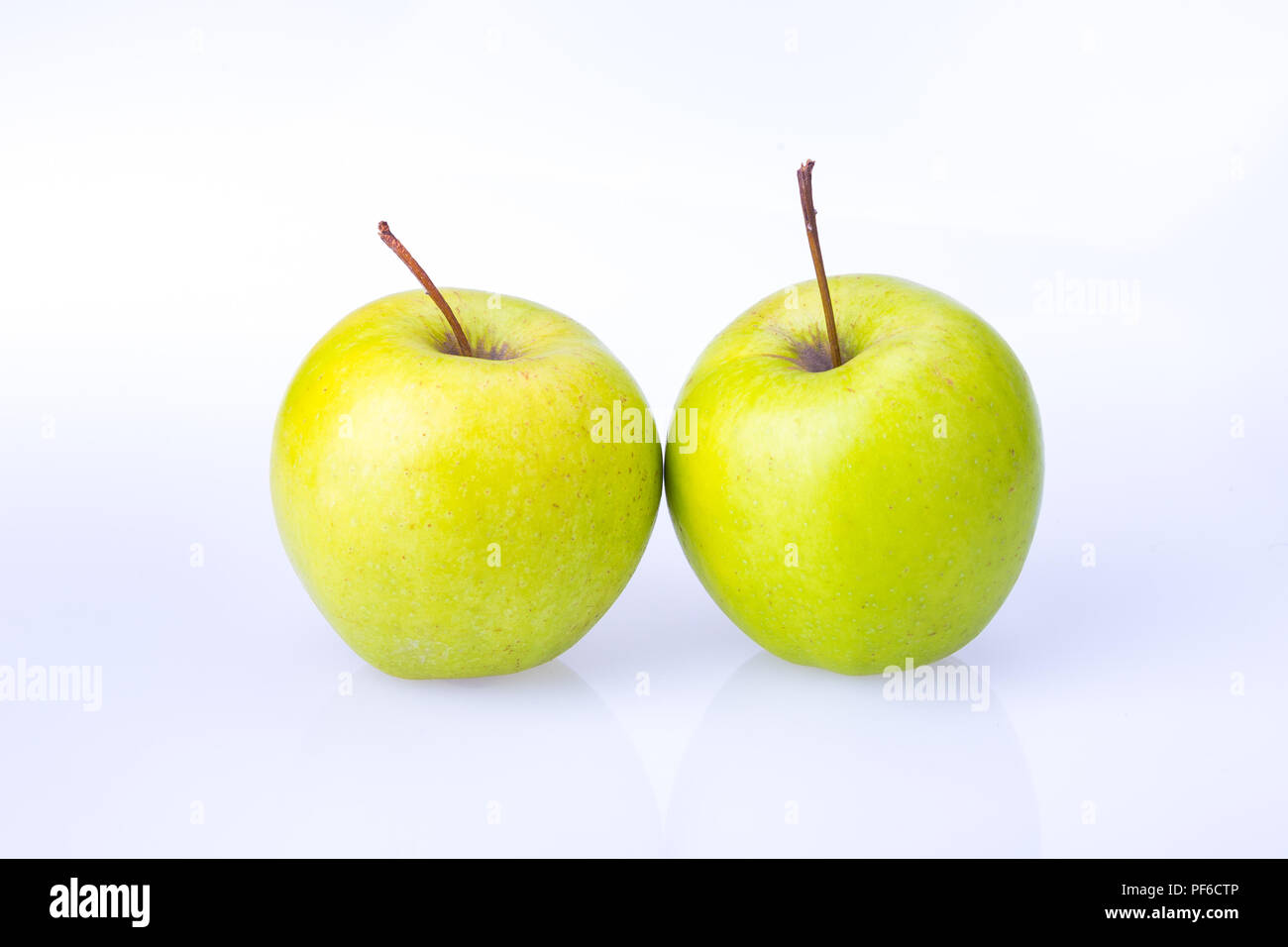 delicious juicy fresh green Apple on gray gradient background Stock ...