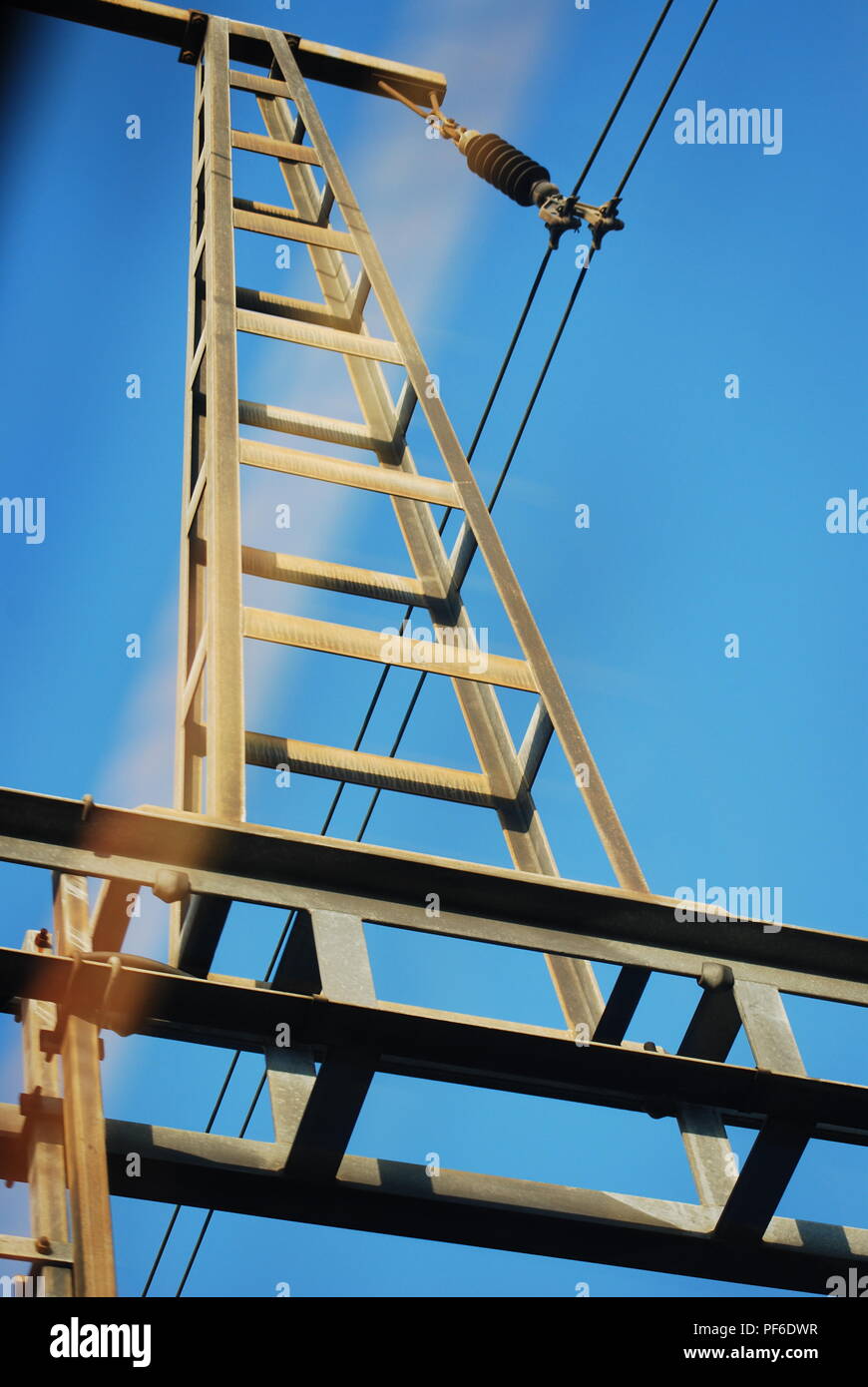 An abstract of the upper cables of a railroad track Stock Photo - Alamy
