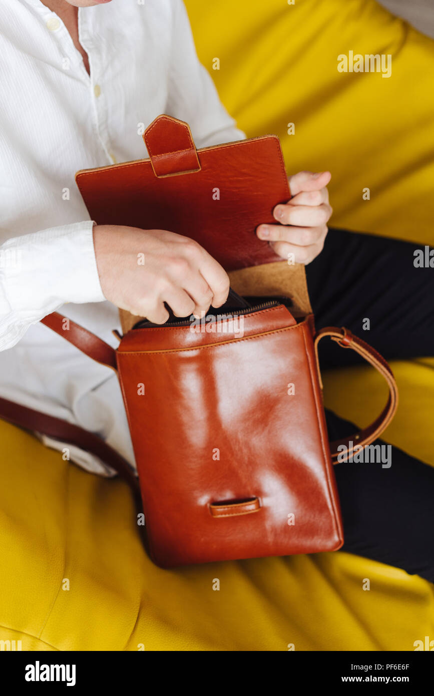 handsome guy with leather bag Stock Photo - Alamy