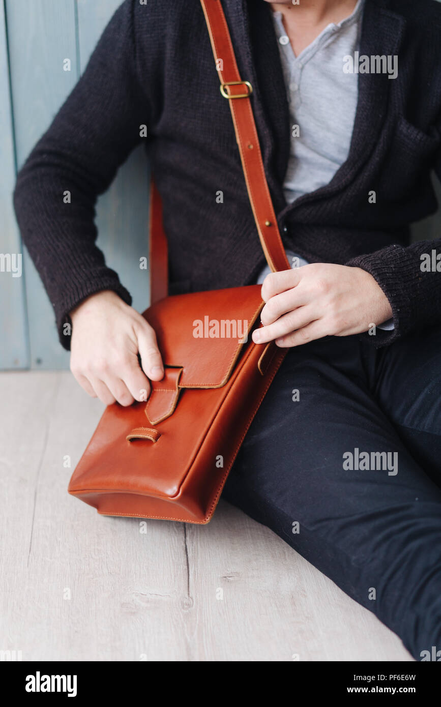 handsome guy with leather bag Stock Photo - Alamy