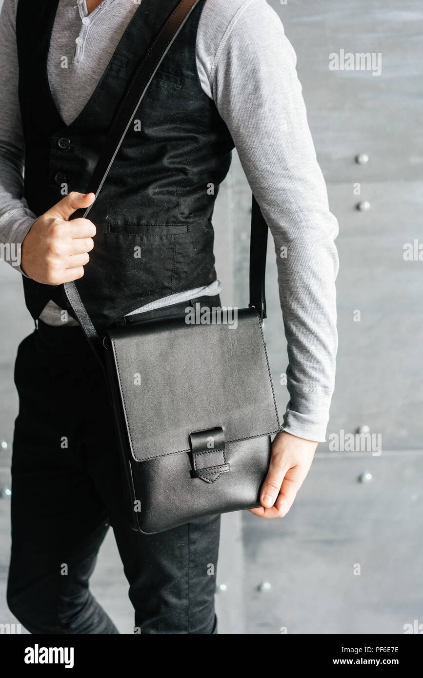 handsome guy with leather bag Stock Photo - Alamy