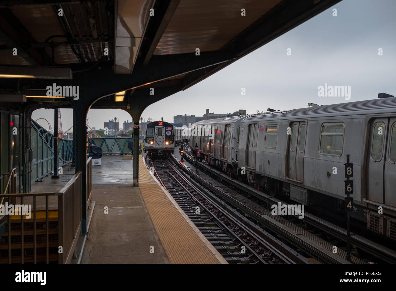 Subwaystation with incoming Train Stock Photo - Alamy