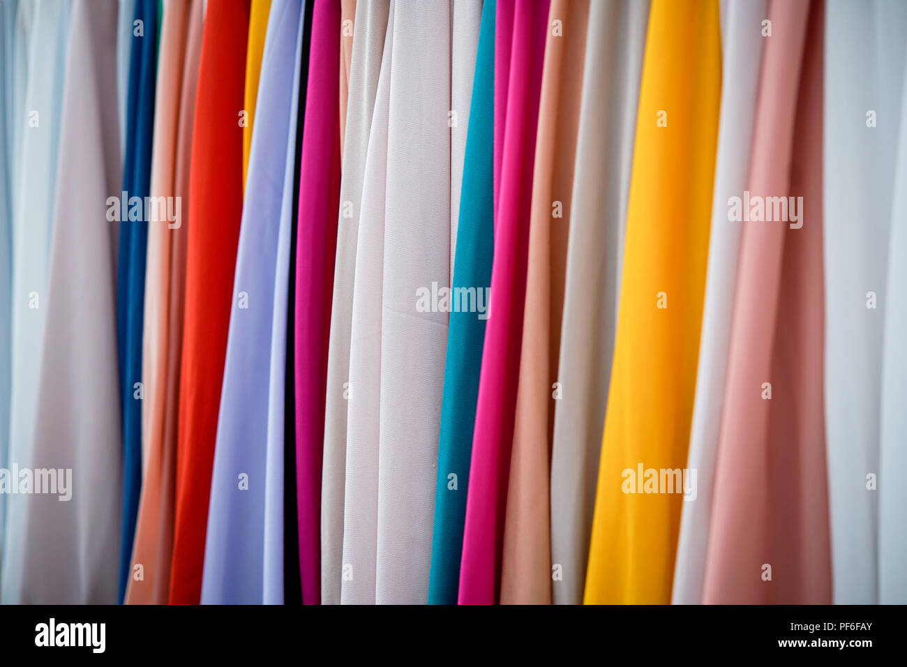 colorful clothes background Stock Photo - Alamy