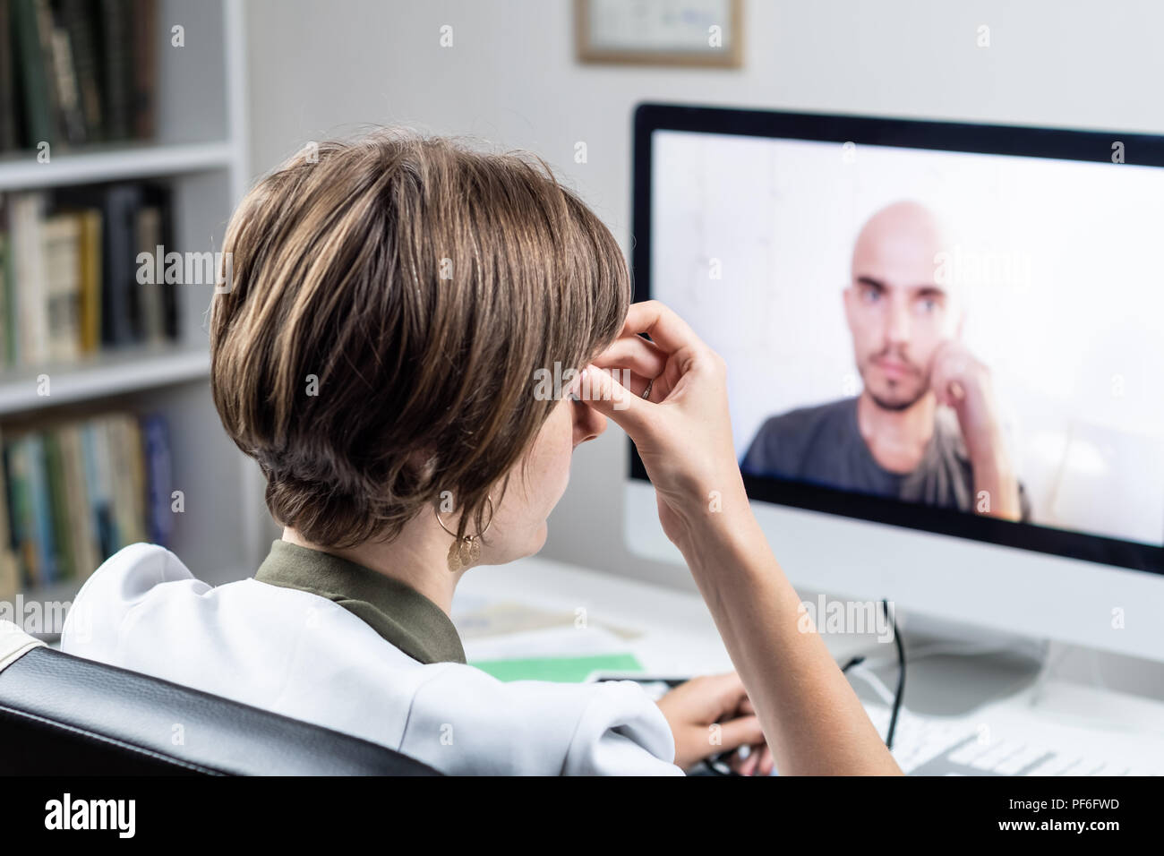 Digital health concept: practicing physician having online appointment ...