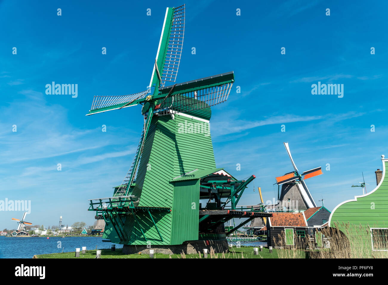 A green windmill in the blue sky, Netherlands Stock Photo - Alamy