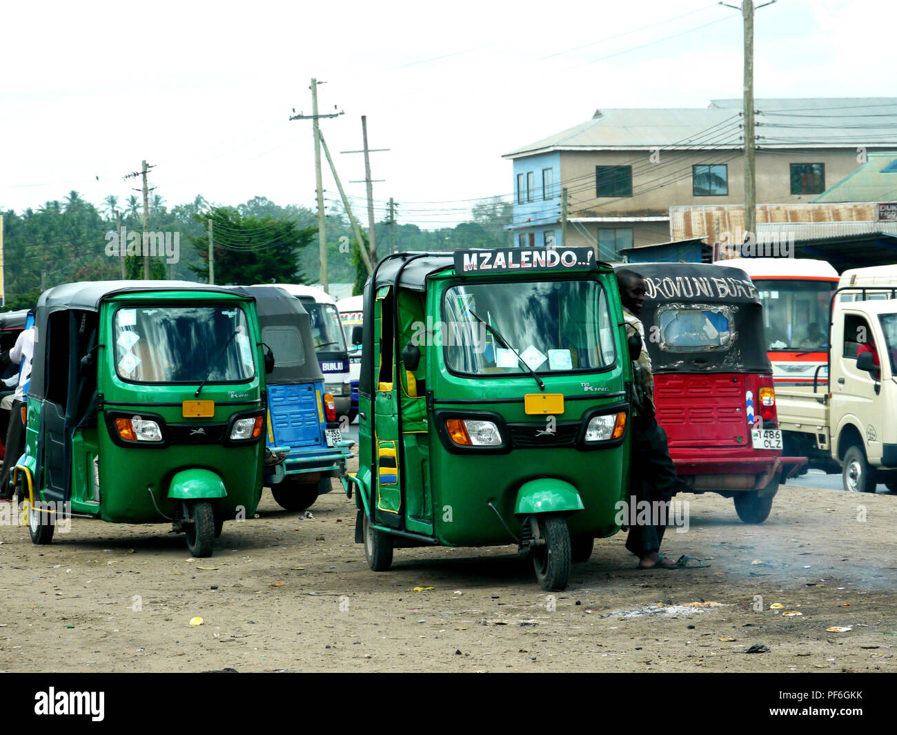 Tuk-tuk three wheeler taxis in a suburb of Dar es Salaam, the ...