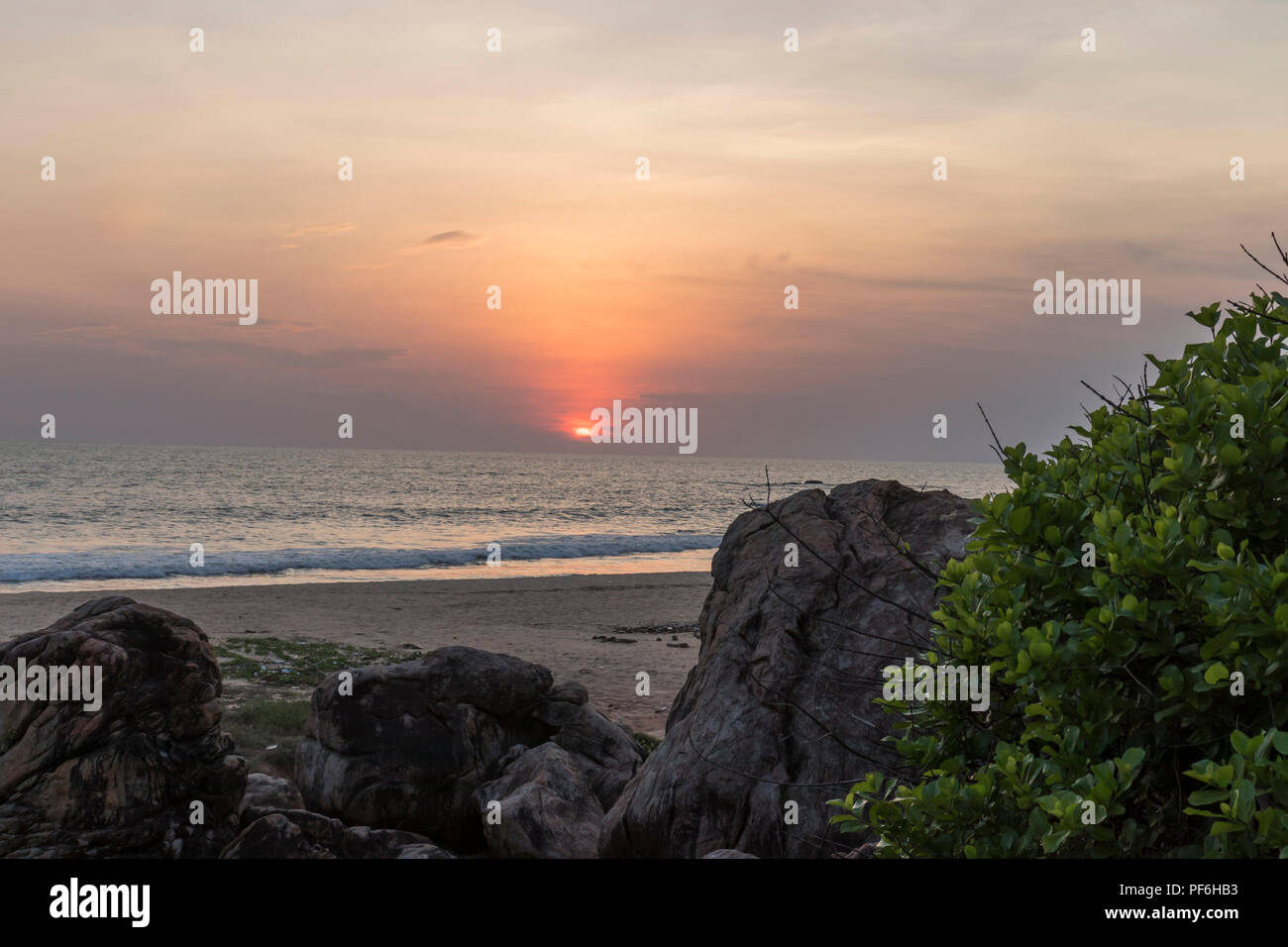 Sunset at the beach during hot summer day Stock Photo - Alamy