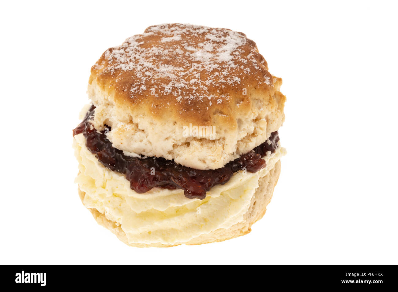 Fresh scone with whipped cream and strawberry jam - white background ...