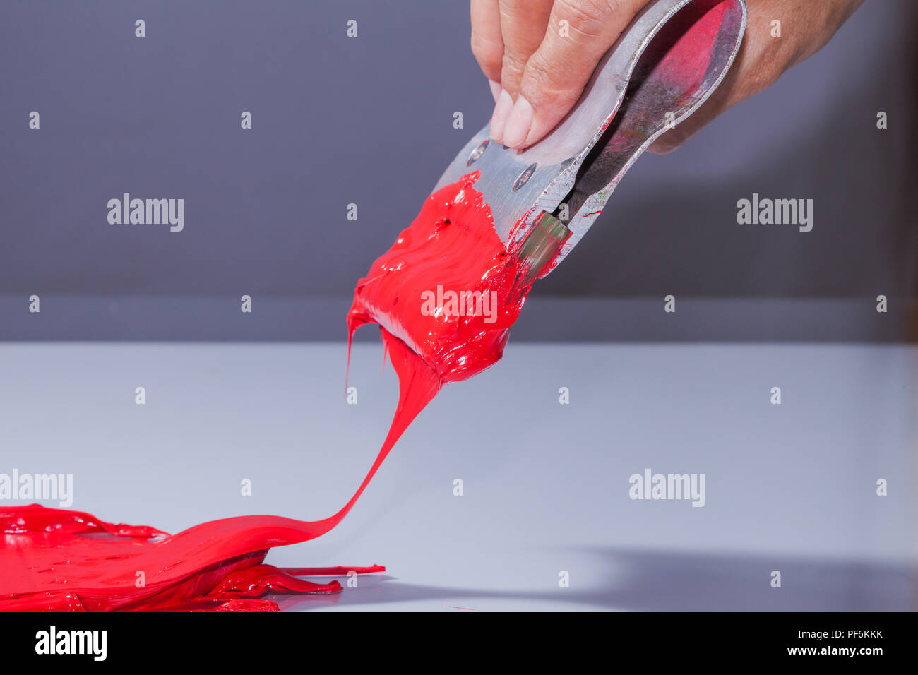 red color of plastisol ink on white background. plastisol ink use for ...