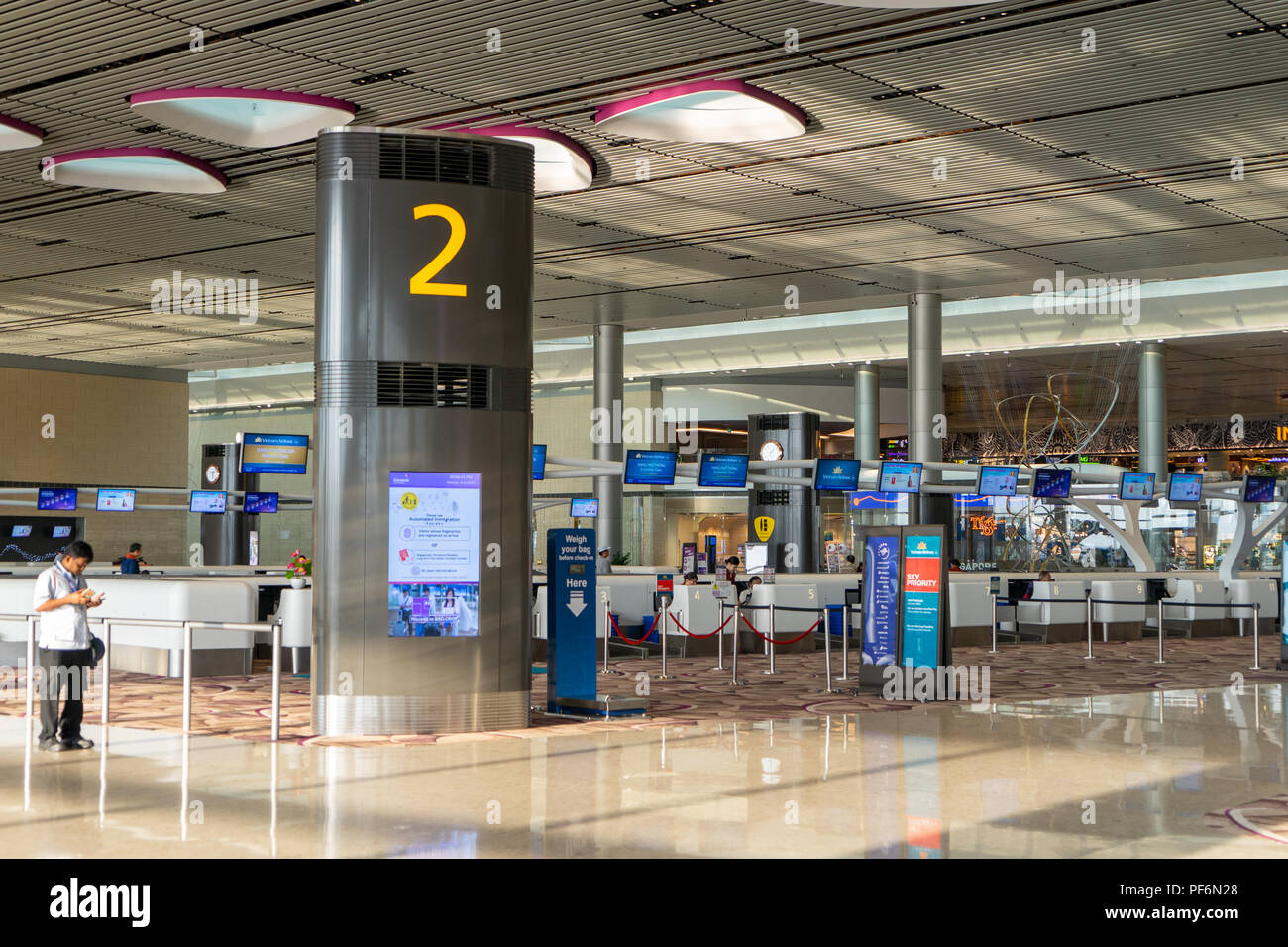 Singapore - Julyy 14, 2018: Visitors walk around Departure Hall in ...