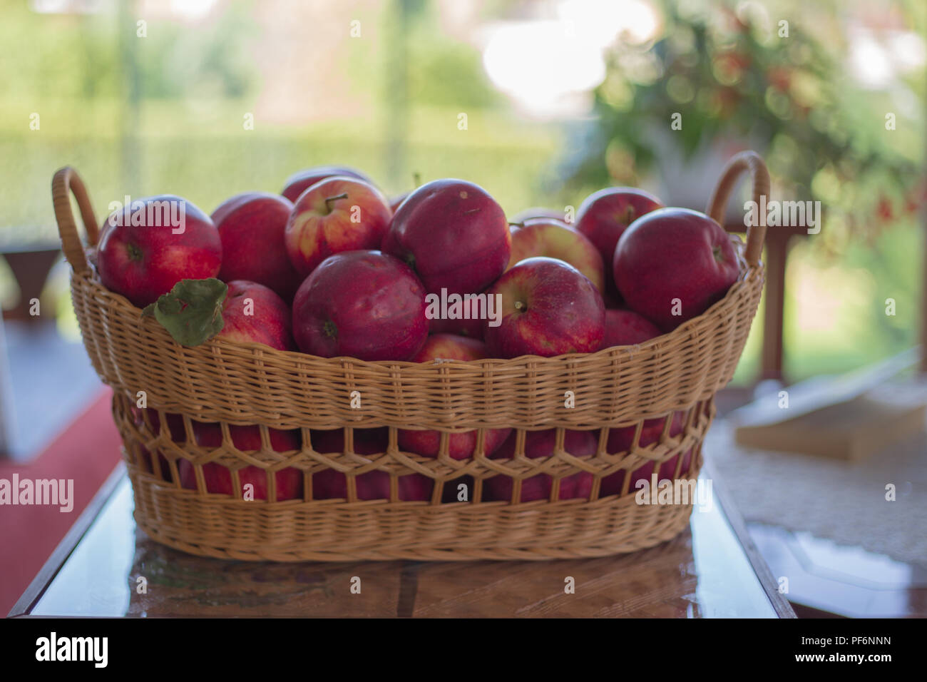 Beautiful red and green apples in a basket in summer hi-res stock ...