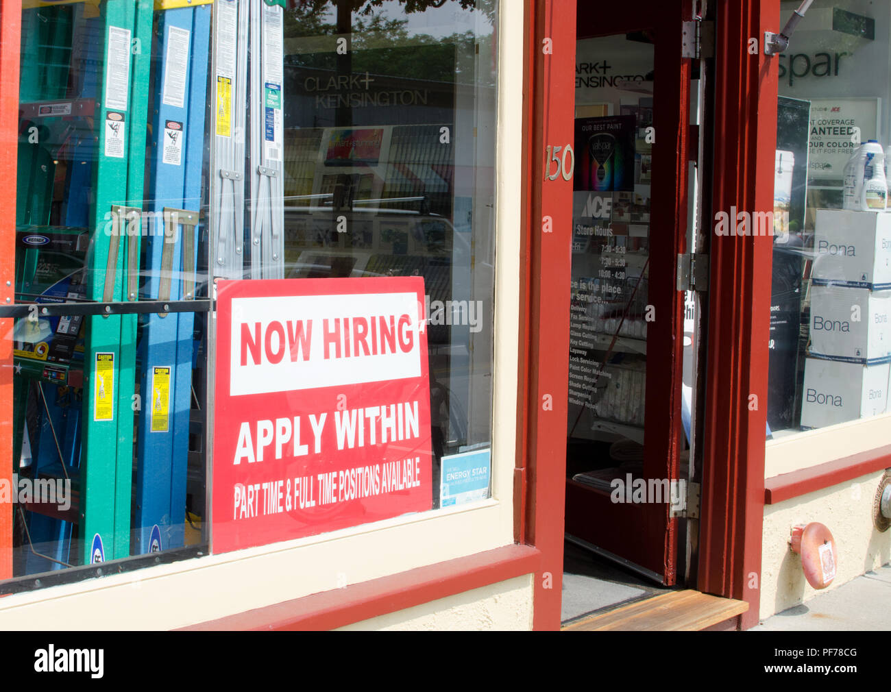 Help wanted sign in store window during summer in downtown Falmouth ...