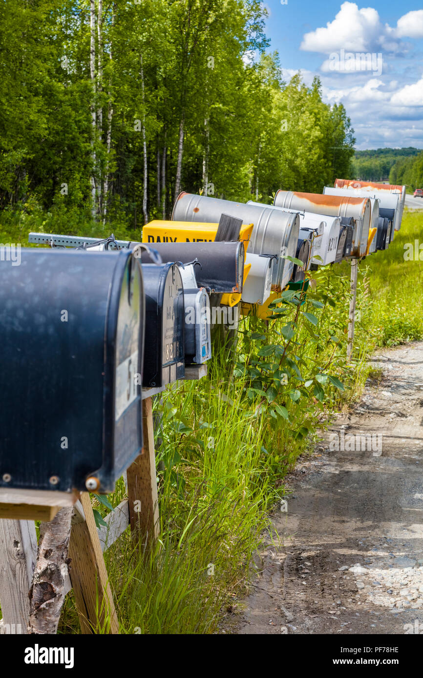 Line of mailboxes along side road Stock Photo - Alamy