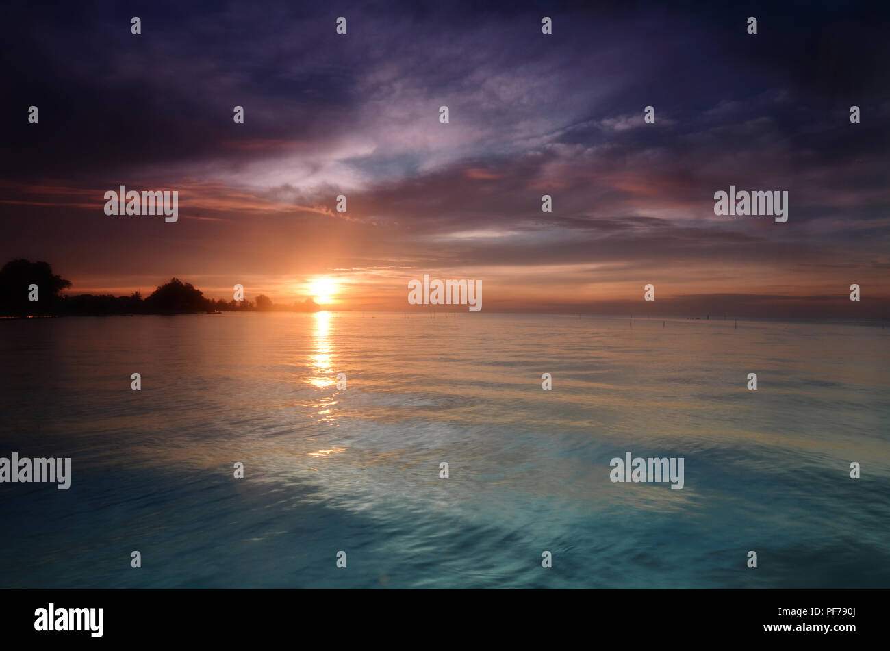Tanjung Sepat beach in the morning light Stock Photo - Alamy