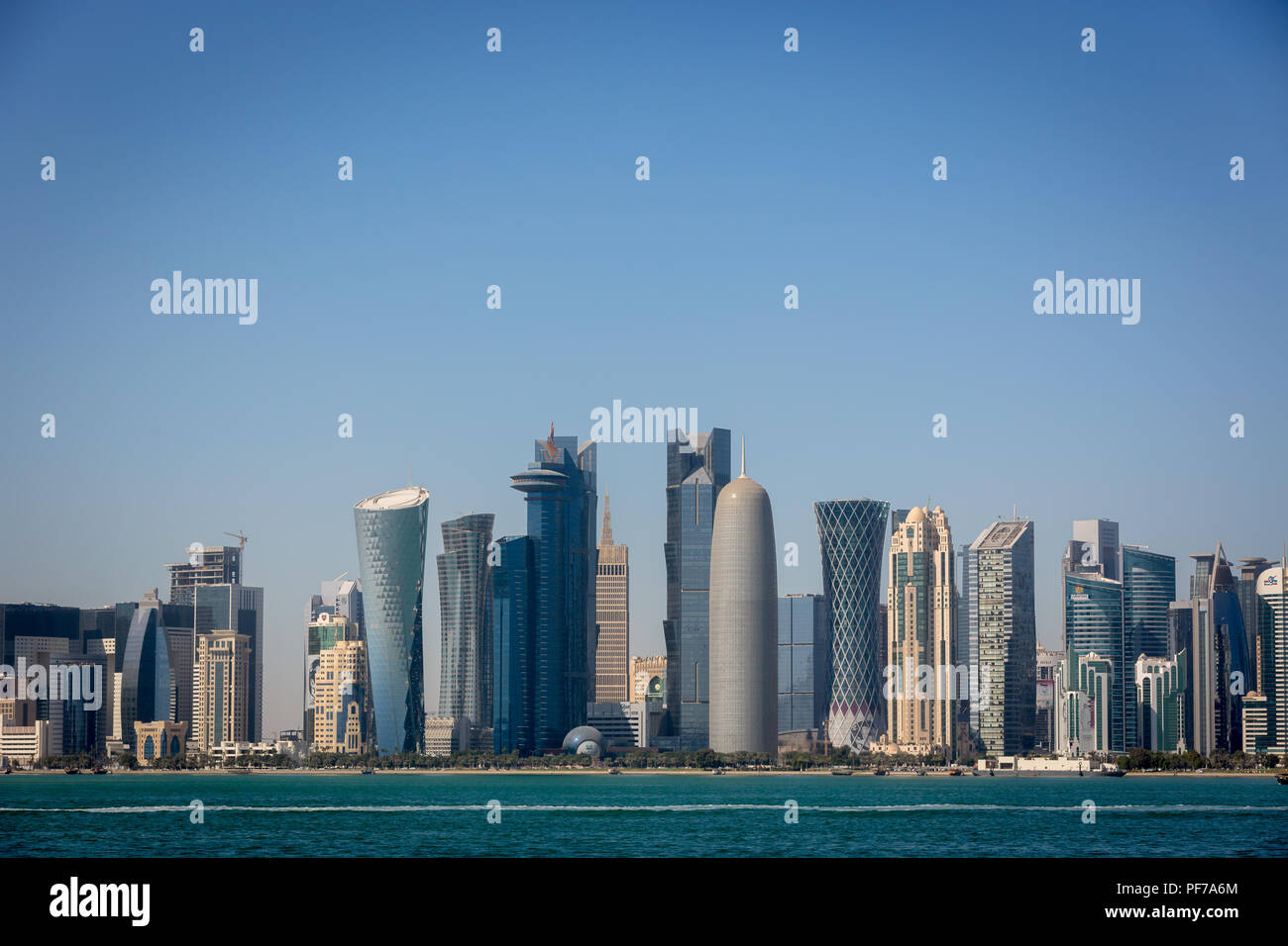 The skyline of Doha in a haze winter day in Qatar Stock Photo - Alamy