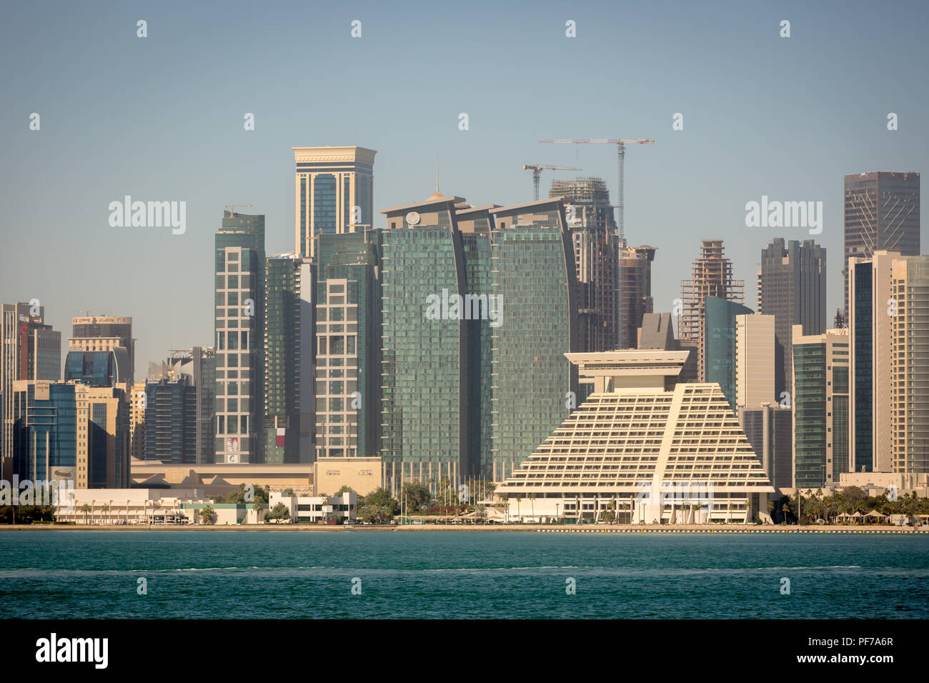 The skyline of Doha in a haze winter day in Qatar Stock Photo - Alamy
