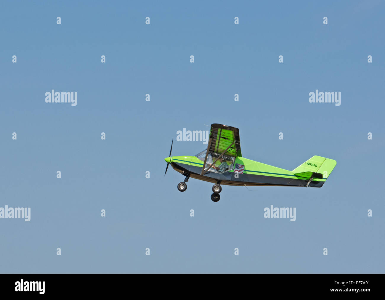 small plane flying on air show Stock Photo - Alamy