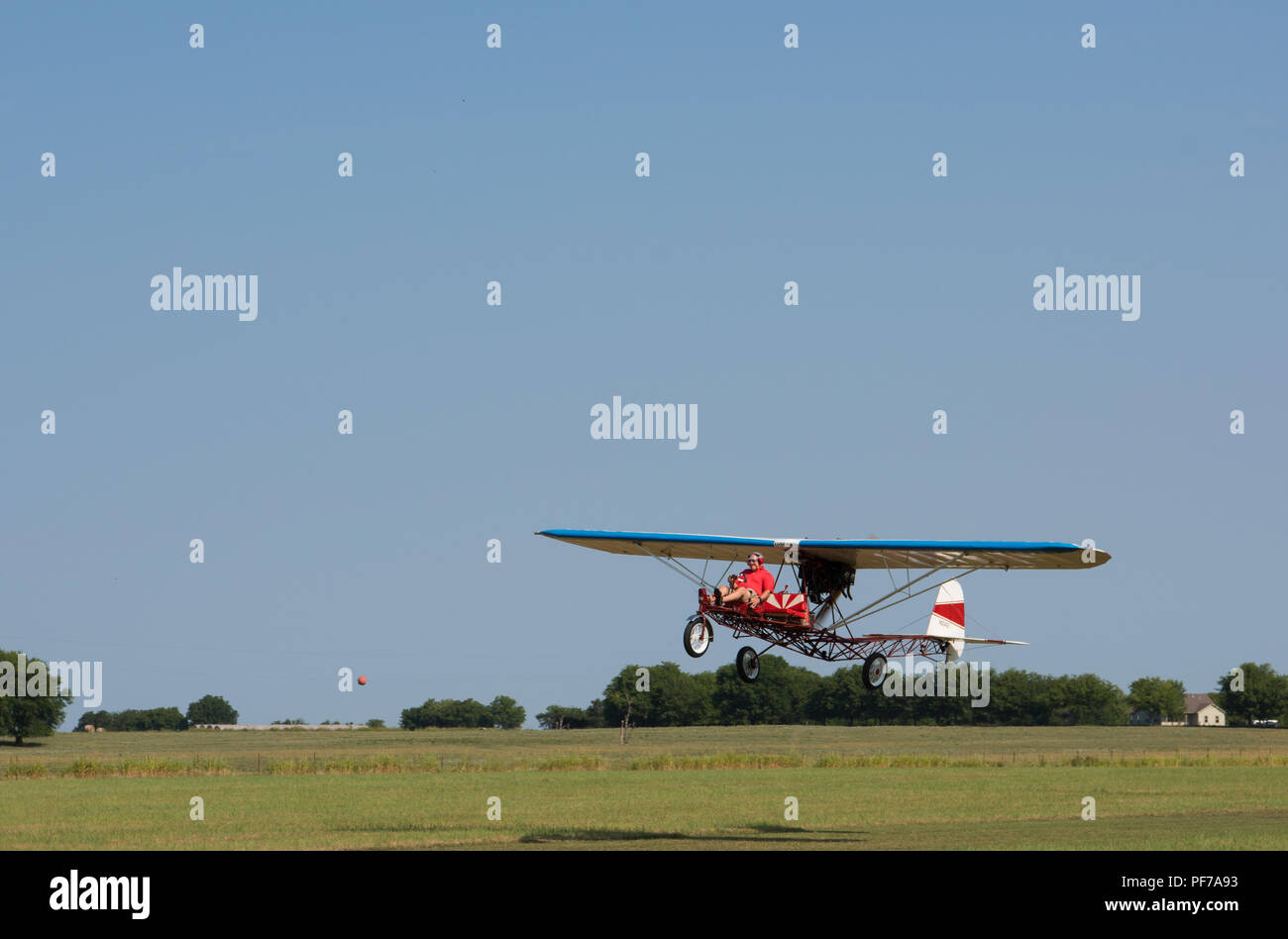 small plane flying on air show Stock Photo - Alamy