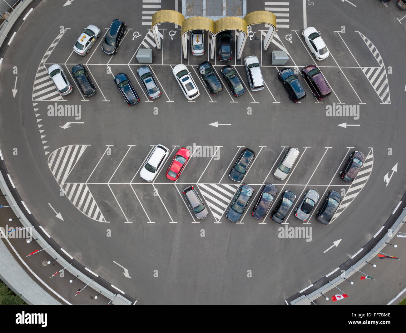 The parking for cars of circular shape with markings and fences for ...
