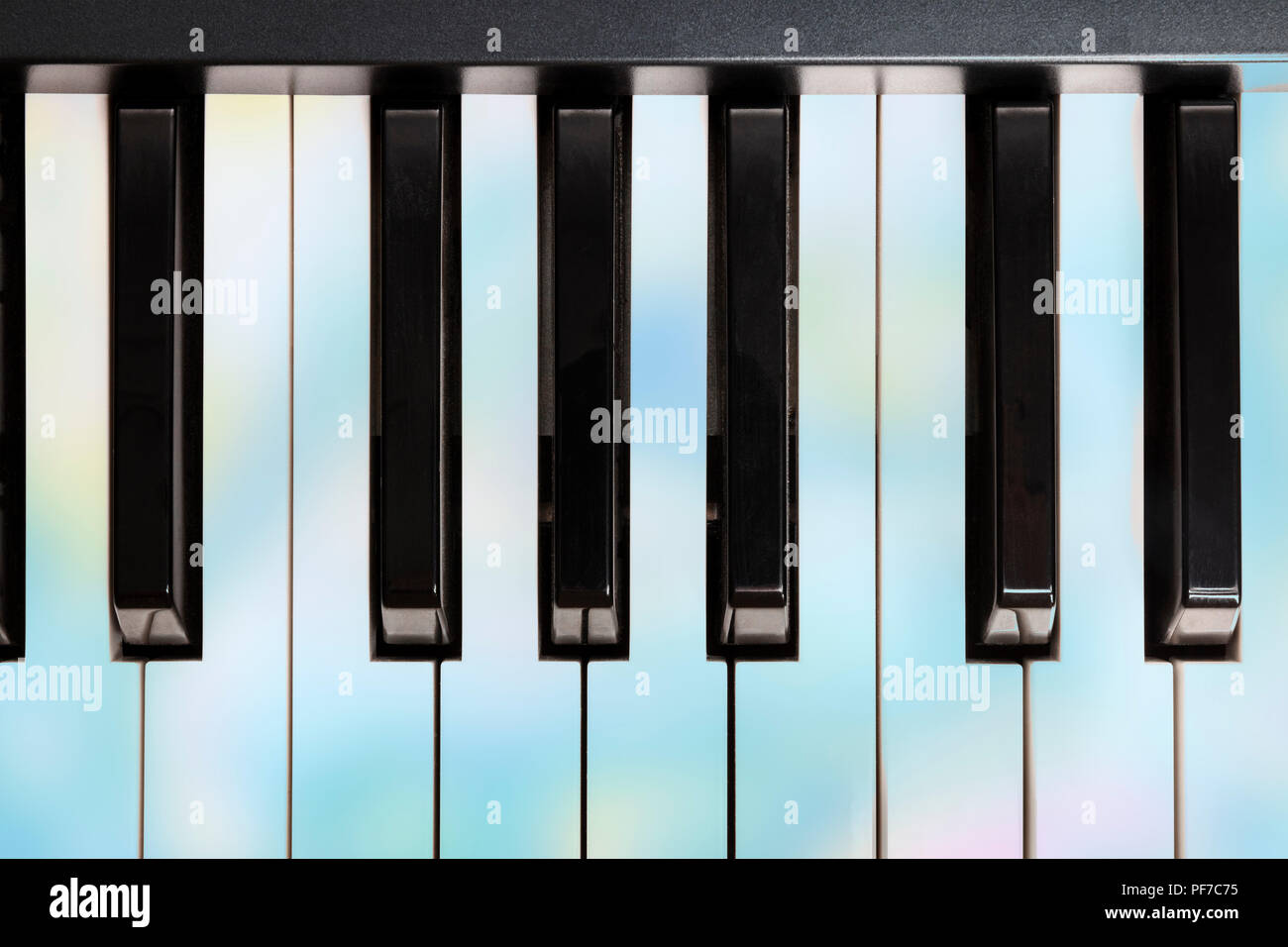 An overhead photo of piano keys, musical notes, toned Stock Photo - Alamy