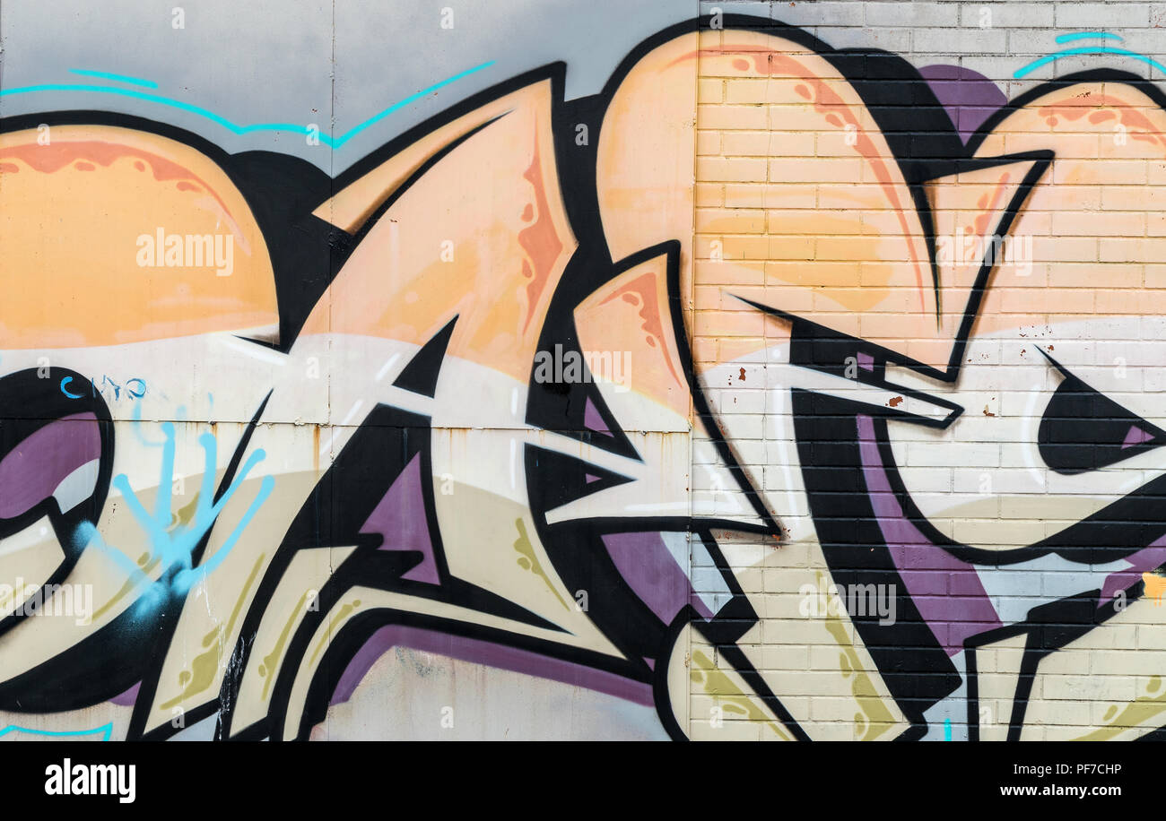 Street art. Colorful graffiti on the wall. Detail of a graffiti Stock ...