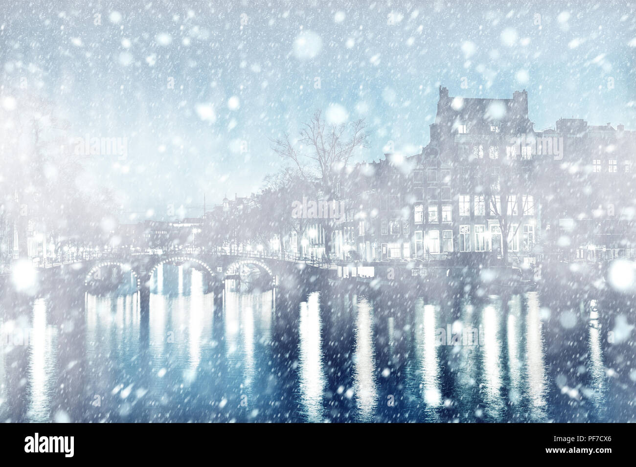 View of Amsterdam by night with snow, Netherlands Stock Photo - Alamy