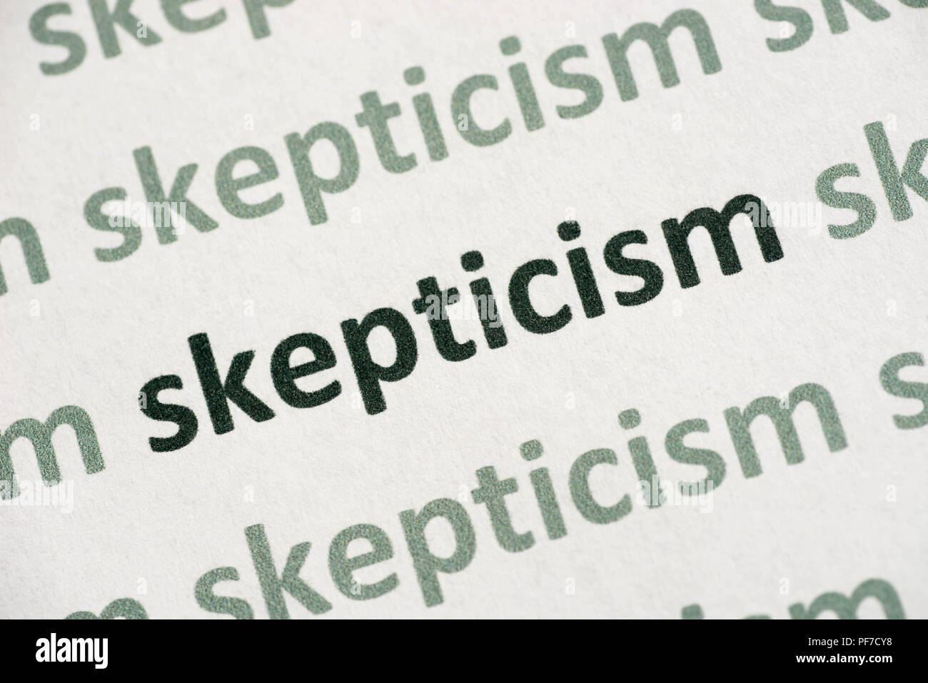 word skepticism printed on white paper macro Stock Photo - Alamy