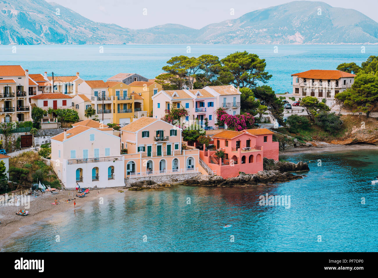 Assos village. Vivid colorful local house buildings close to ...