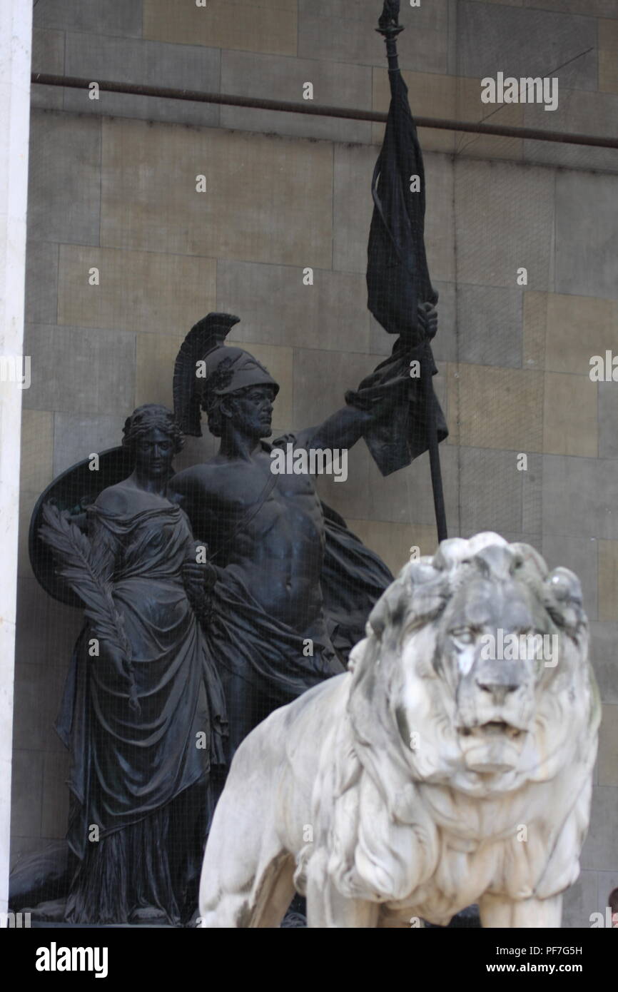 Germany. Bayern. Munich. Statue of a warrior and the lions in ...