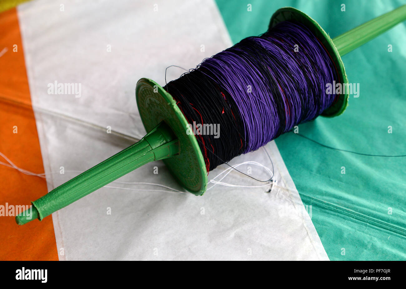 Colorful Indian kites and string Stock Photo - Alamy