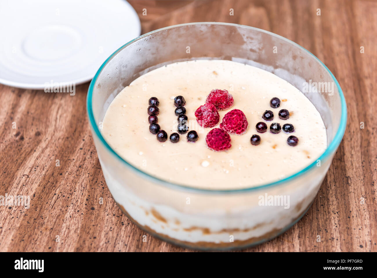 Macro closeup of three tiered vanilla golden light white yellow cream ...