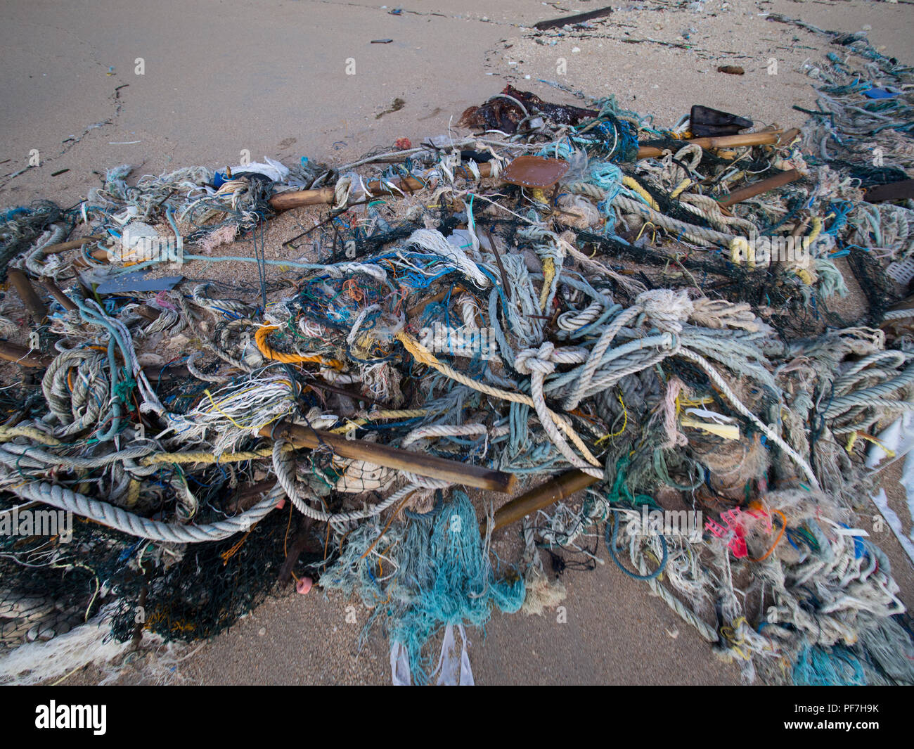 Marine debris washed up on a beach in Thailand Stock Photo - Alamy