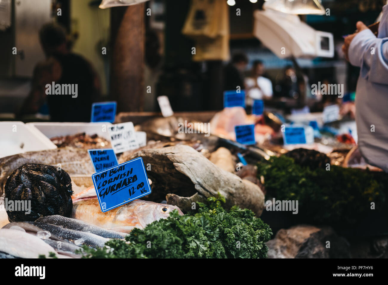 Fresh fish on sale at a street food market Stock Photo - Alamy