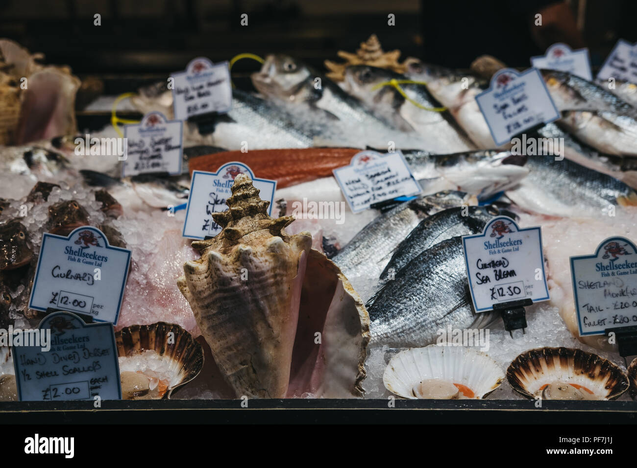 London, UK - July 24, 2018: Fresh fish on sale at a fishmonger stall in ...
